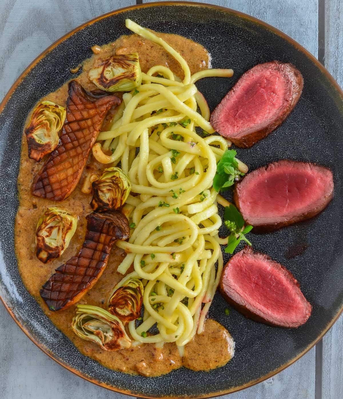 Pan Seared Deer Backstrap Steak with Mushroom Cream Sauce